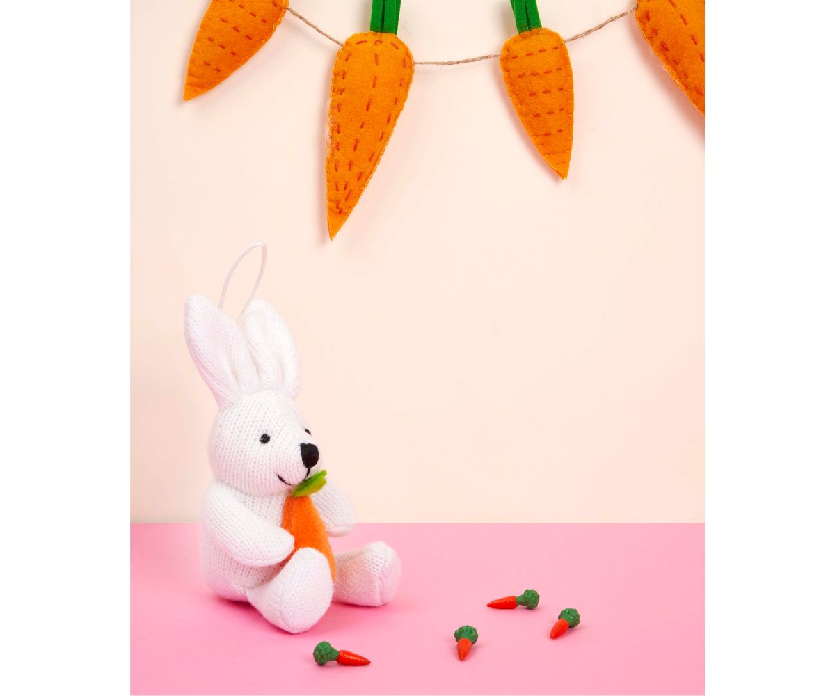 Knitted white bunny with carrot, Spring decorationd