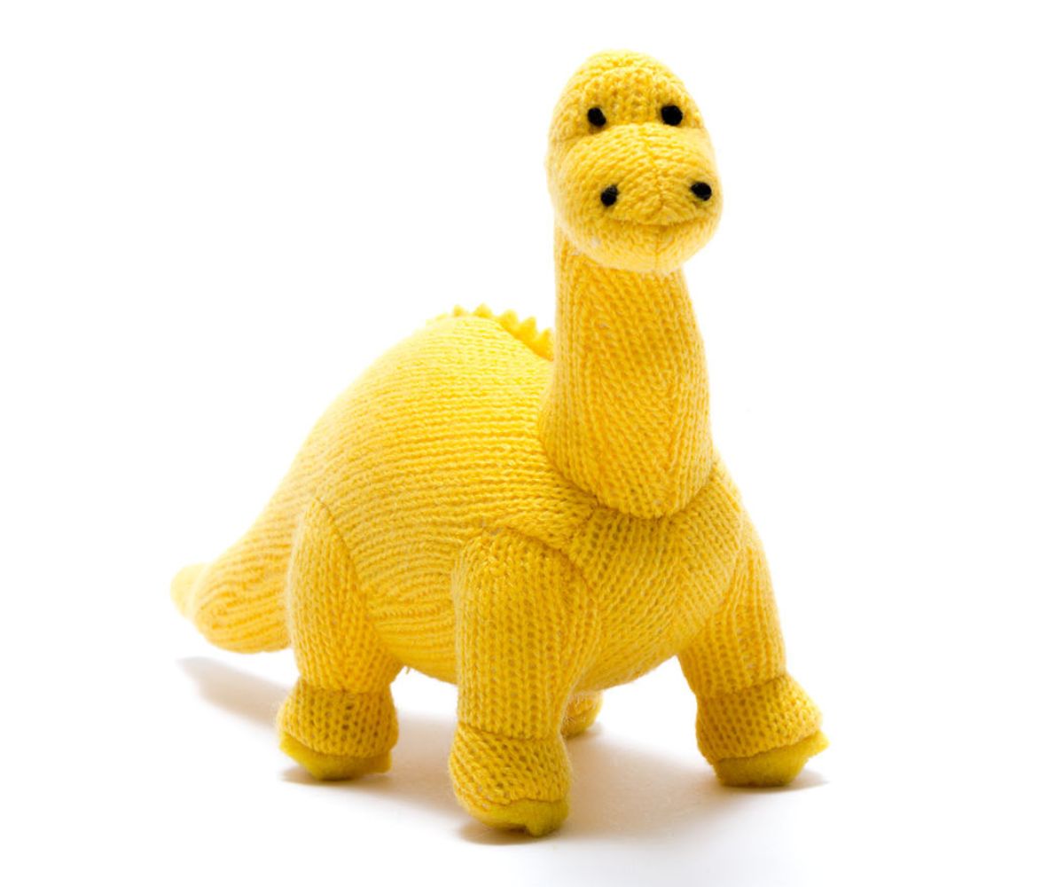 Knitted yellow diplodocus dinosaur baby rattle, baby dinosaur teddy